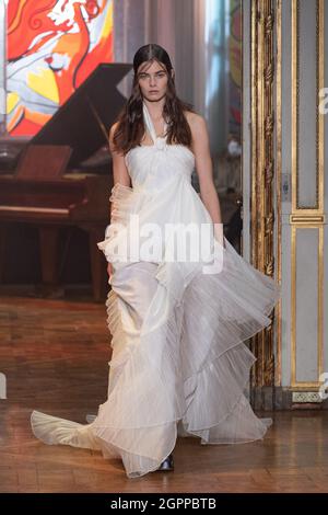 A model walks on the runway at the Rochas fashion show during Fall ...