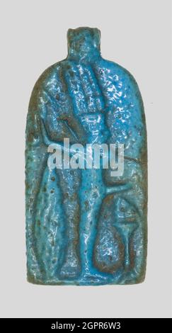 Ancient Egyptian god Amun (Amun-Ra), sitting on his throne and holding ...