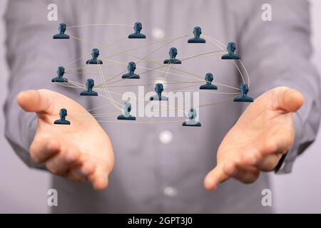 A man's hand shot with 3D rendered calendar levitating above it Stock ...