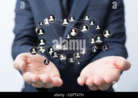 A man's hands shot with 3D rendered calendar levitating above them ...