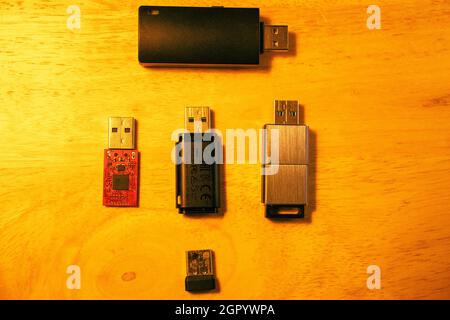 random items on a desk with a light colored wooden background Stock ...