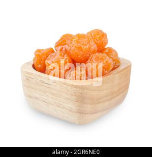 Dried prunes fruits (Preserved fruits Chinese plum) in wooden bowl ...