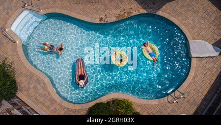 Swimming trunks floating on water surface Stock Photo - Alamy
