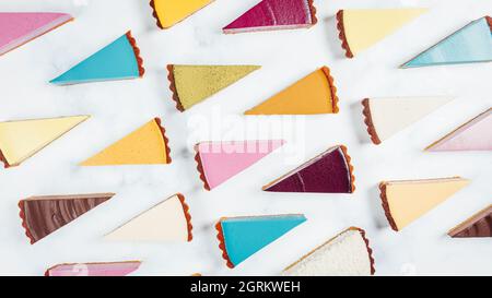 Vegan cakes cut in a triangle shape on a white background Stock Photo ...