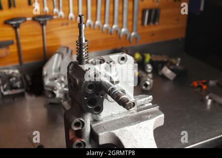 hydraulic repair pumps in the workshop Stock Photo - Alamy