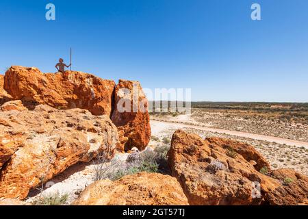 Metal statue of an Aboriginal silhouette, the Granites Nature Reserve ...
