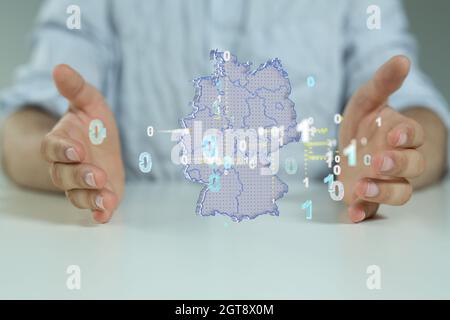 A 3D illustration of the German map and the binary code Stock Photo - Alamy