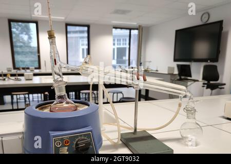 Distillation device in a chemistry classroom at school. Electronic ...