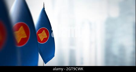 Small flags of the ASEAN on an abstract blurry background Stock Photo ...