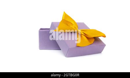Blank open purple gift box with yellow ribbon bow isolated on white ...