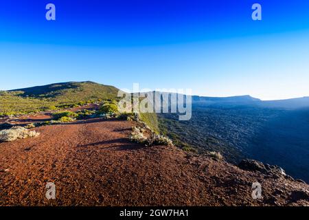 Landscape with cliffs of the volcanic area at Reunion Island with a ...