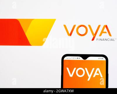 In this photo illustration a Voya Financial logo seen displayed on a ...