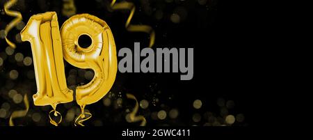 number nineteen, gold foil balloon number on a blue velvet background ...