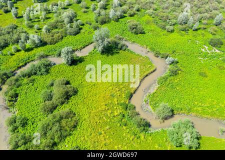 Aerial view of the Sutla (Sotla) River, a border of Croatia and ...