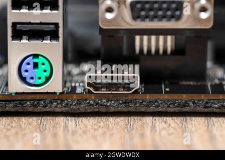 The rear panel of a desktop computer motherboard with visible ...