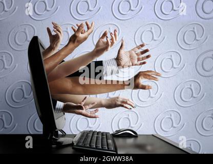 hands coming out of computer monitor trying to grab a person, identity ...