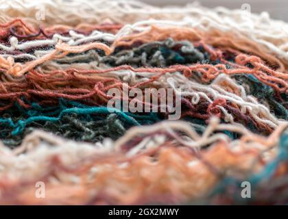photography with colorful, variegated, bright wool yarn fragments ...