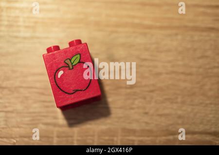 POZNAN, POLAND - May 12, 2020: Plastic Lego duplo block with orange ...