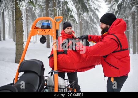 Paramedics from mountain rescue service provide operation outdoors in ...