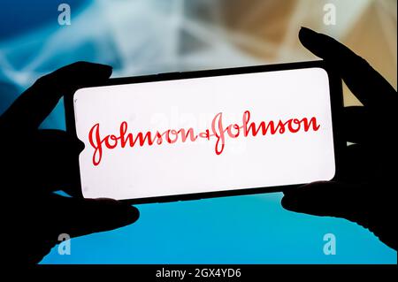 In this photo illustration, the Johnson & Johnson logo seen displayed ...