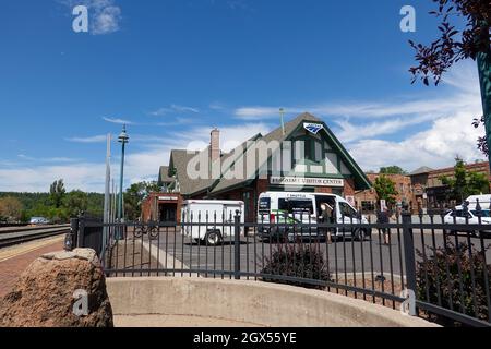 Groome transportation airport shuttle van with trailer for extra ...