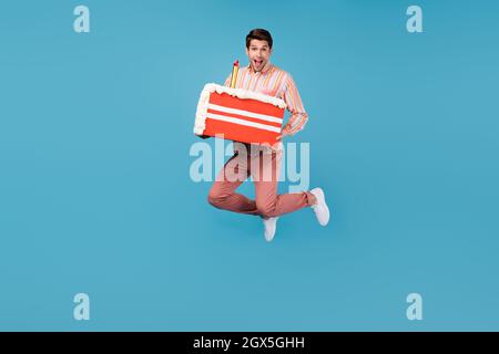 Full size photo of sweet young lady sit on bag wear sweater jeans ...