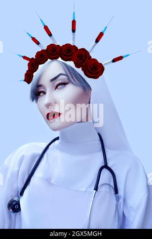 Gothic Nurse in white uniform Stock Photo - Alamy