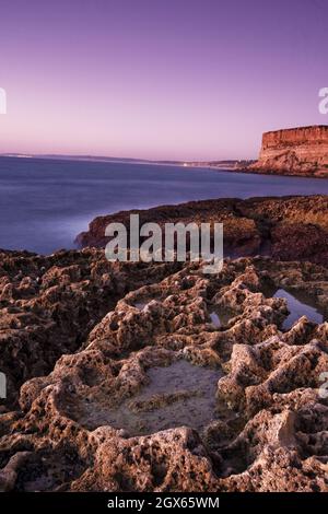 Vertical shot of the Praia da Foz beach during sunset Stock Photo - Alamy