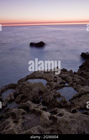 Vertical shot of the Praia da Foz beach during sunset Stock Photo - Alamy