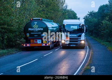 Asda supermarket fuel delivery tanker behind Scania truck on motorway ...