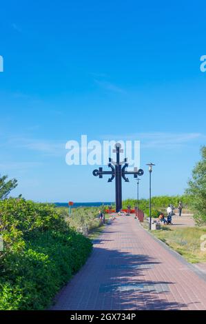 REWA, POLAND - Jan 31, 2016: A big cross statue in the park in Rewa ...