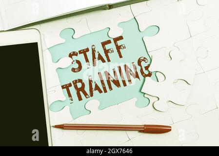 Text sign showing Staff Training. Business photo text program that ...
