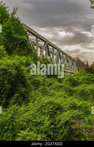 Vertical shot of a bridge on a gloomy day Stock Photo - Alamy