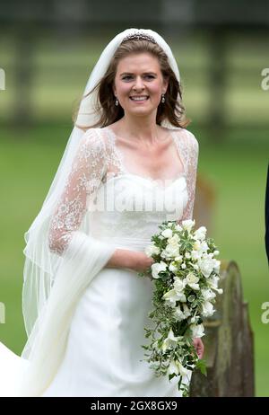 Lady Laura Marsham arrives to marry James Meade at St. Nicholas Church ...