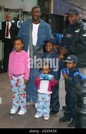 Lindford Christie and his children at the Premiere of Finding Nemo at ...