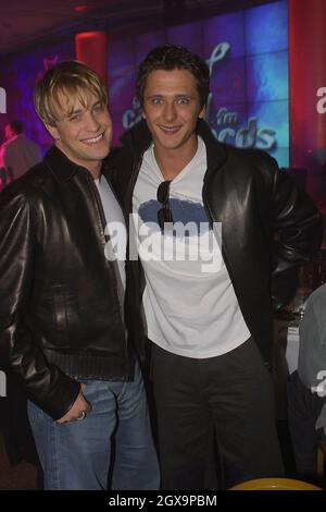 Kian from Westlife and Ritchie from Five at the Capital Help a London ...
