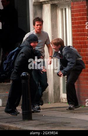 1HUGH GRANT FILMING 'ABOUT A BOY' AT CLERKENWELL GREEN IN LONDON. THE ...