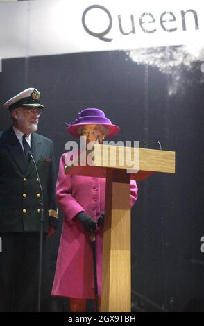 The Queen with Cmdr Ronald Warwick and Cunard President Pamela Conover ...