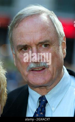John Cleese attending the premiere of Shrek 2, in London's Leicester ...