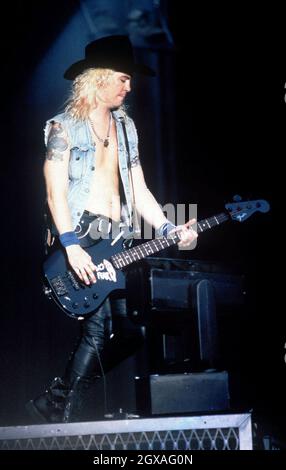 Duff of Guns n' Roses performing live in the late 1980's Stock Photo ...