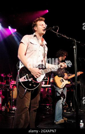 British indie band Gomez playing live in concert, New York Stock Photo ...