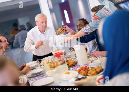 modern multiethnic muslim family enjoying eating iftar dinner together ...