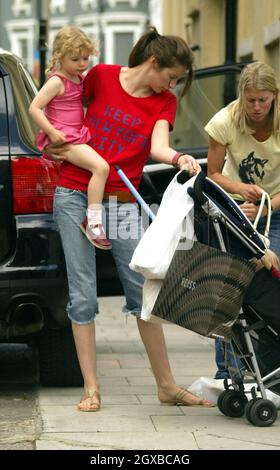 Jools Oliver pictured near her London home with her two daughters Poppy ...