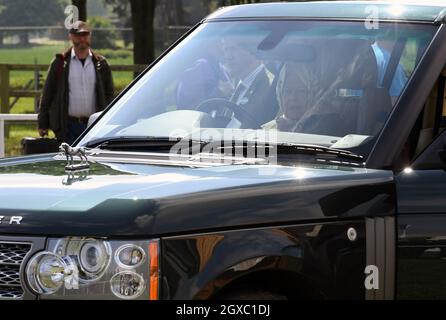 Queen Elizabeth arrives driving a Range Rover to attend the Royal ...