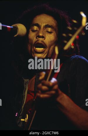 Jamaican Reggae singer Bob Marley performs in front of an audience of ...