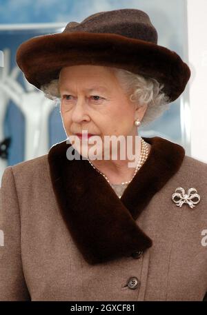 Queen Elizabeth II looks anxious following the breaking story regarding ...