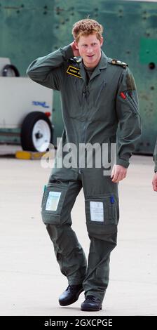 Prince Harry attends a photocall during his military helicopter ...