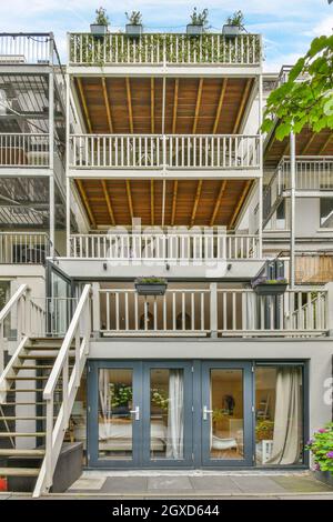 The exterior of a modern building with transparent balconies Stock ...