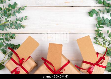 empty xmas wish list with little gift on wooden background Stock Photo ...