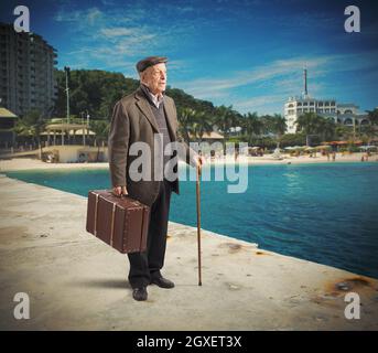 An elderly man pensioner tourist goes to see the sights of an ancient ...